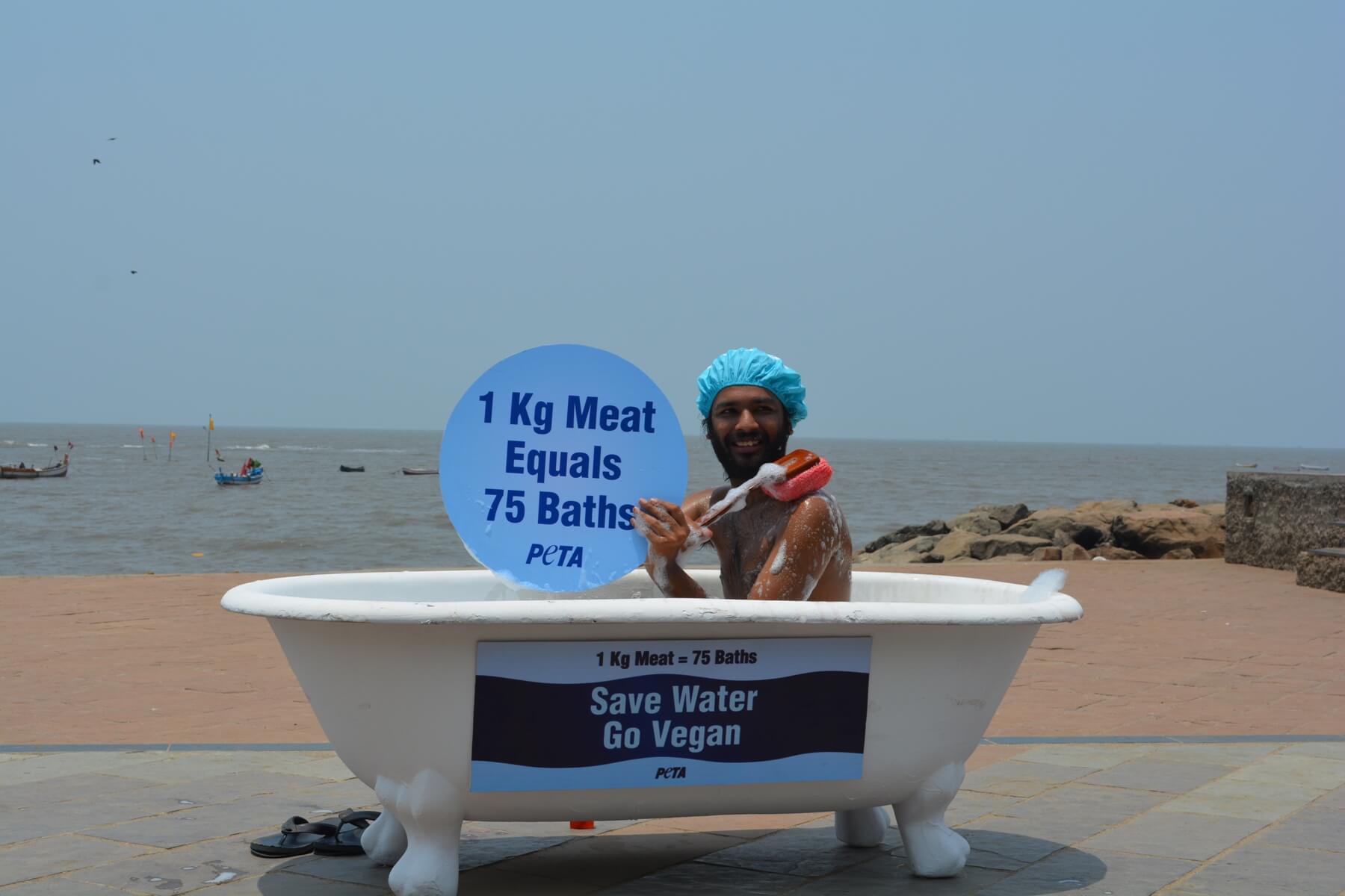 PHOTOS: Man Takes Public Bath for Earth Day