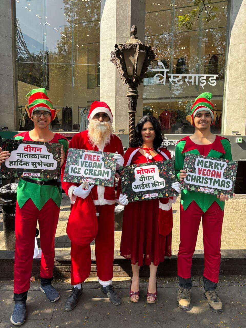 Santa and Mrs Claus & Elves Bring Christmas Cheer by Distributing Vegan ...