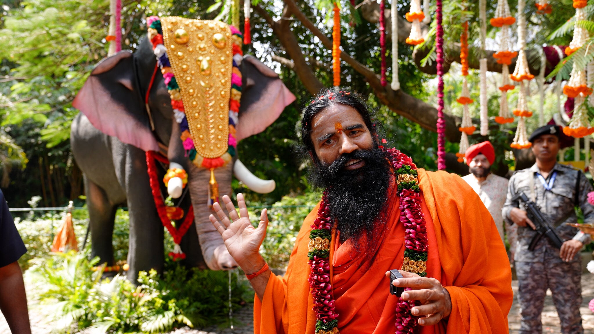 Swami Baba Ramdev Enchanted by First Mechanical Elephant at a Wedding ...